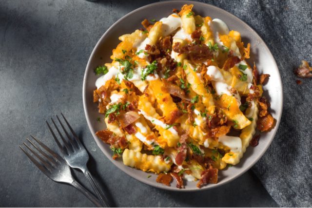 Loaded French Fries - Topped With Cheese, Bacon, & Ranch Dressing