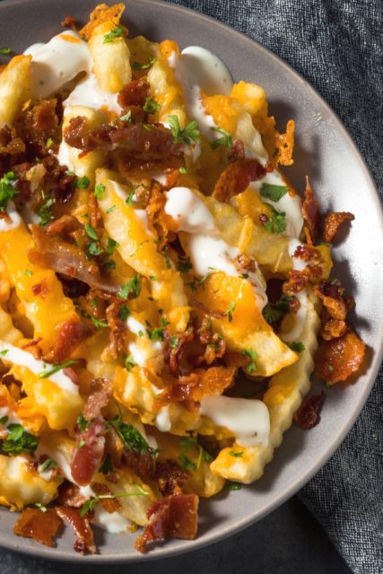 Loaded French Fries - Topped With Cheese, Bacon, & Ranch Dressing
