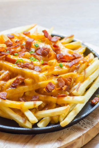 Loaded French Fries - Topped With Cheese, Bacon, & Ranch Dressing